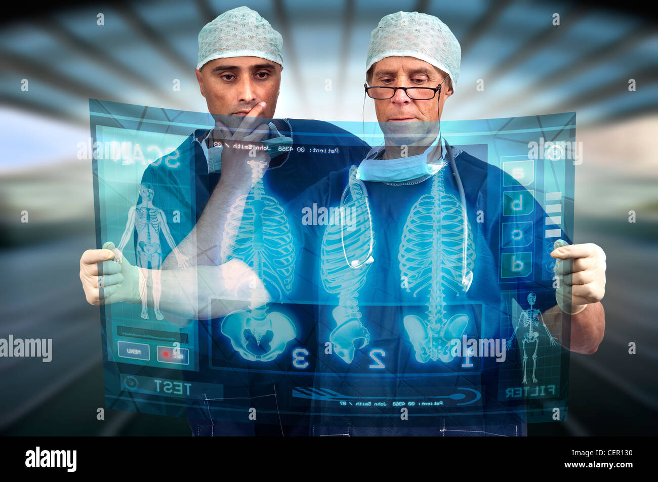 Doctors looking at screens hi-res stock photography and images - Alamy
