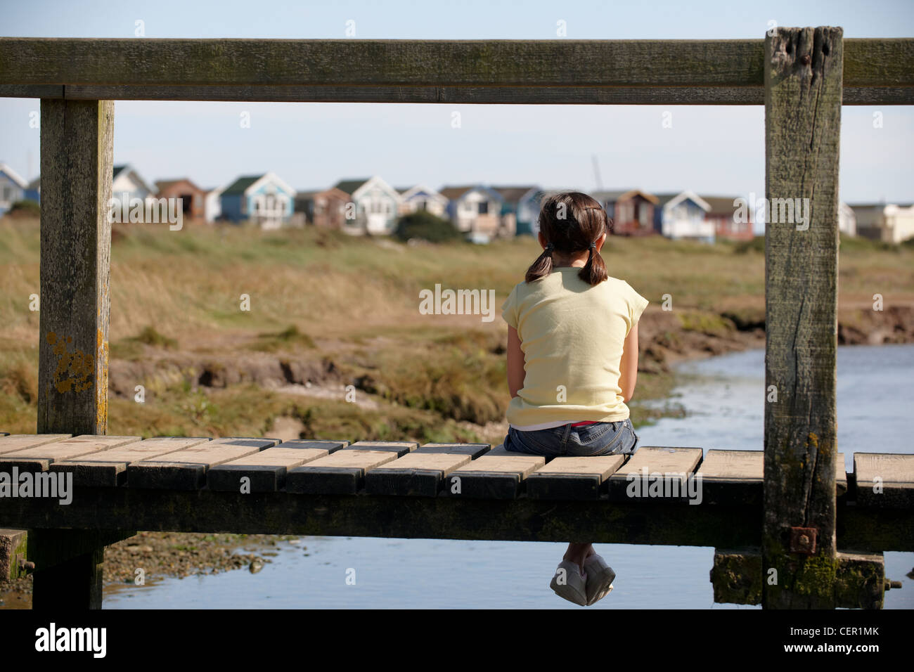Man sitting on bridge in hi-res stock photography and images - Alamy