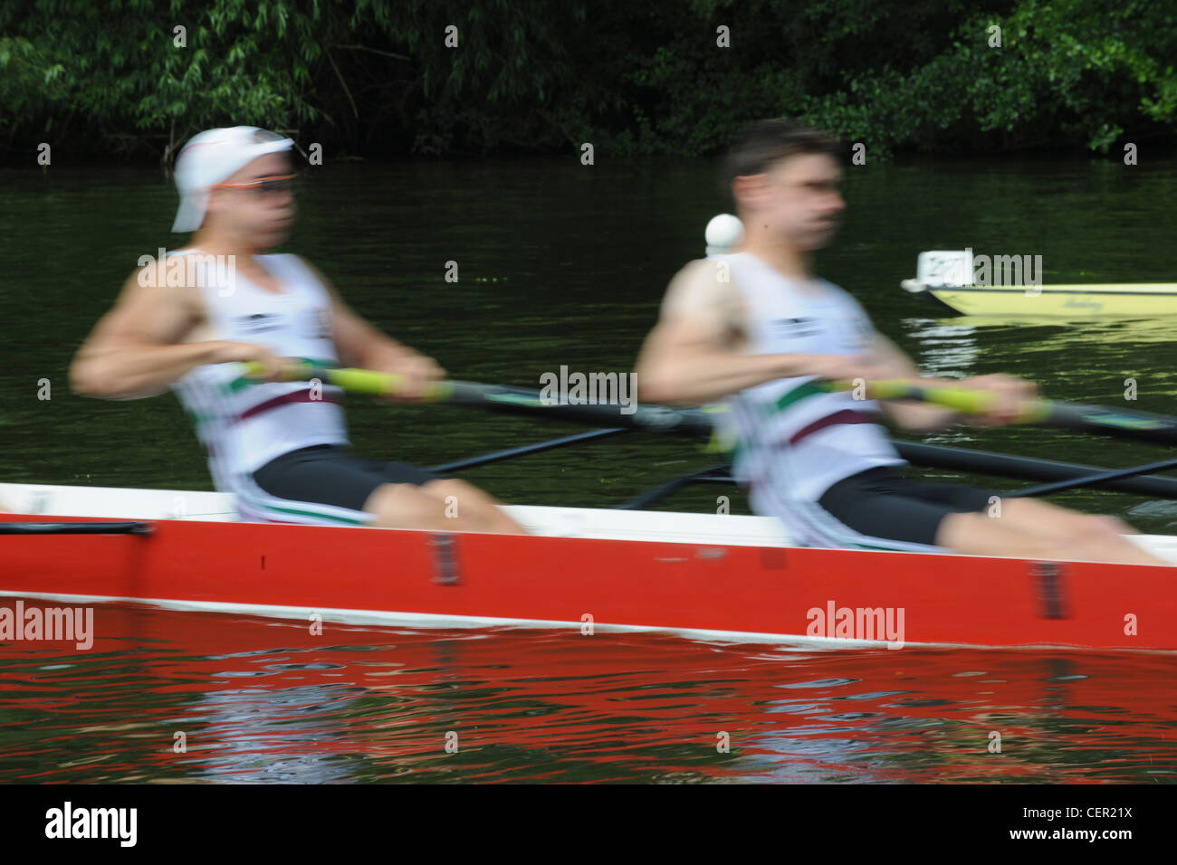 A boat crew rowing hard during a race at the annual Henley Royal ...
