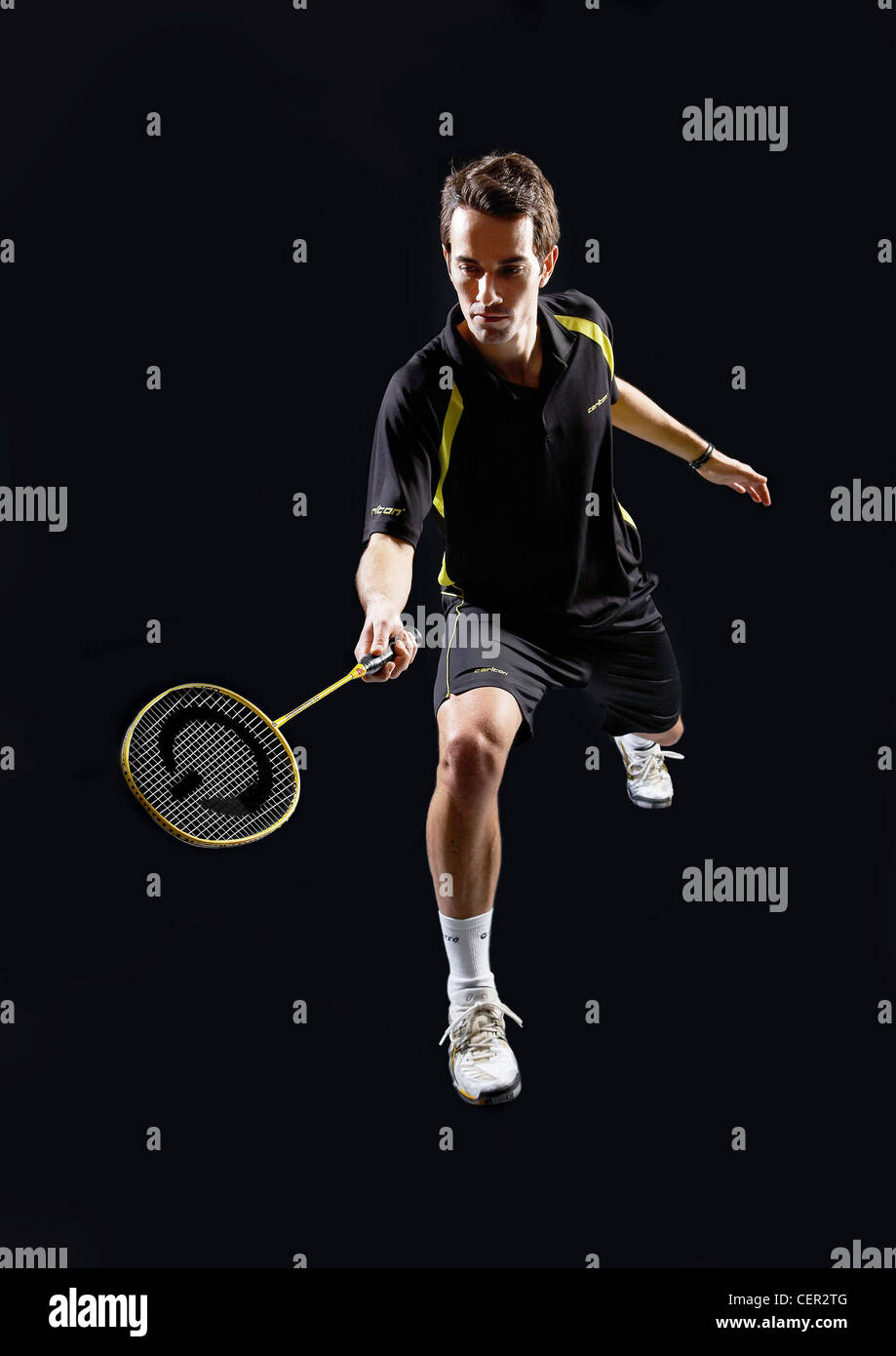 Portrait of Nathan Robertson, World champion badminton player, lunges ...