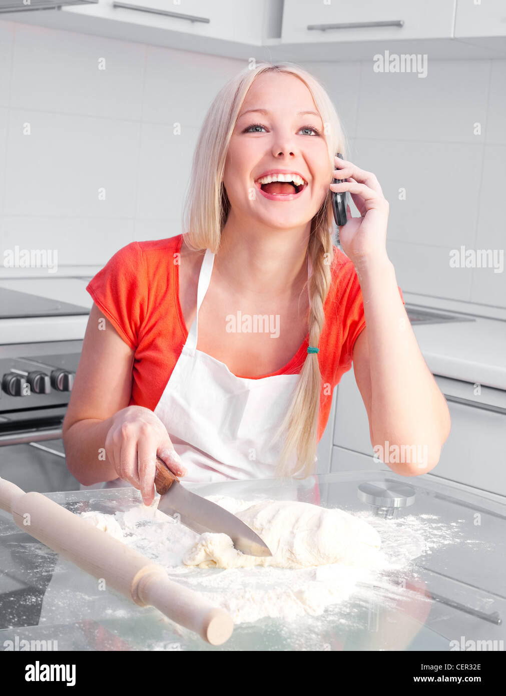 beautiful woman baking in the kitchen Stock Photo - Alamy