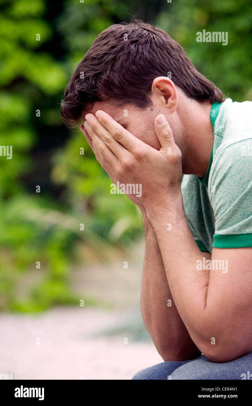Crying man on knees hi-res stock photography and images - Alamy