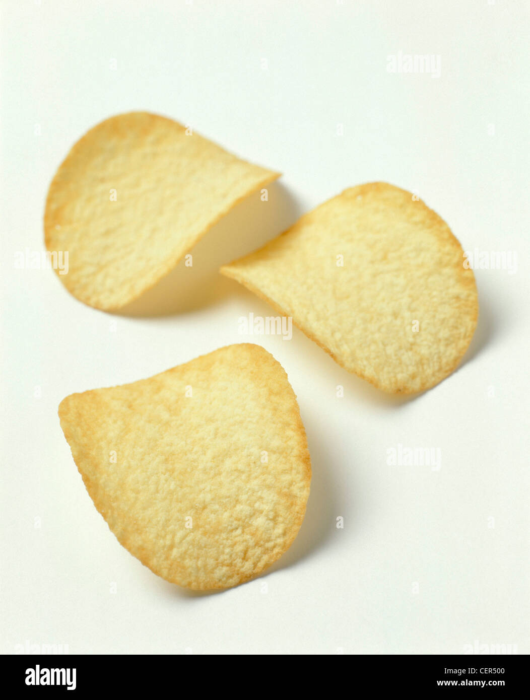 Three pringles against white background Stock Photo - Alamy