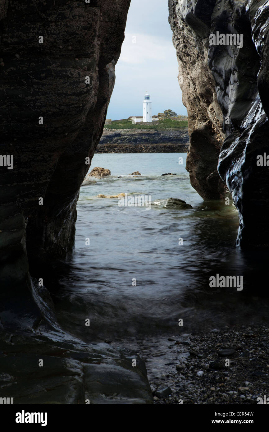 Godrevy lighthouse, built in 1859 to protect ships from a reef called ...