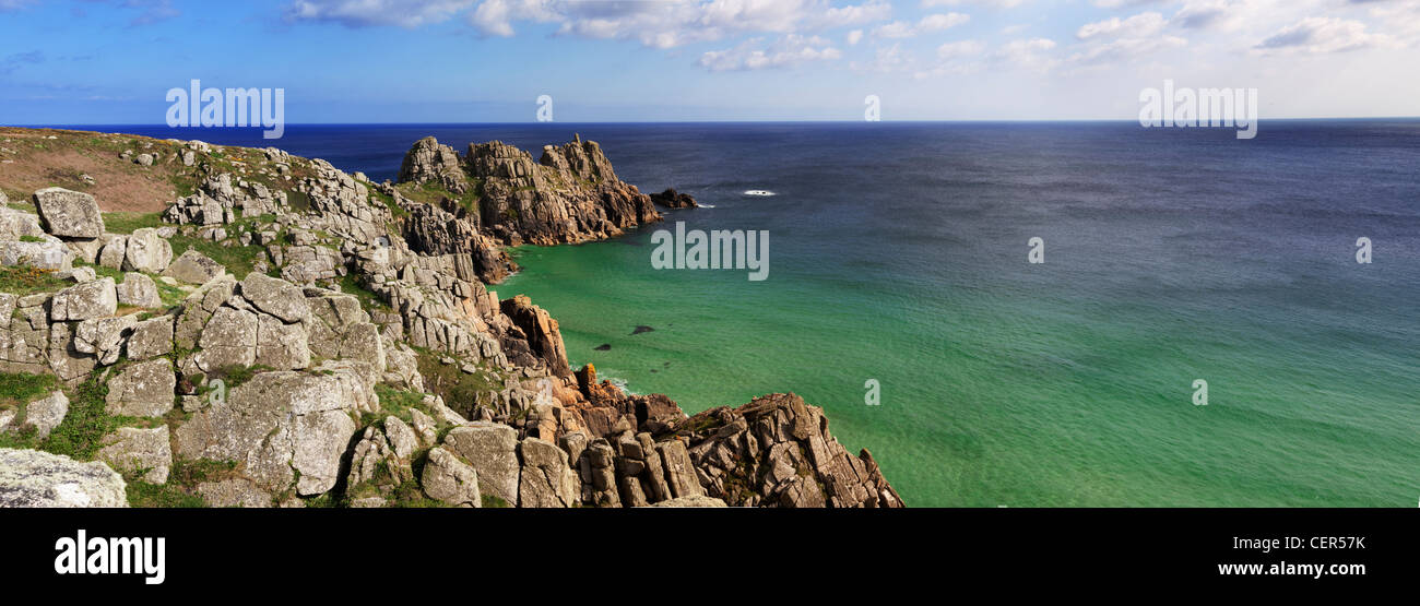 A panoramic view of Logan Rock from Treen cliffs. The cliffs and ...