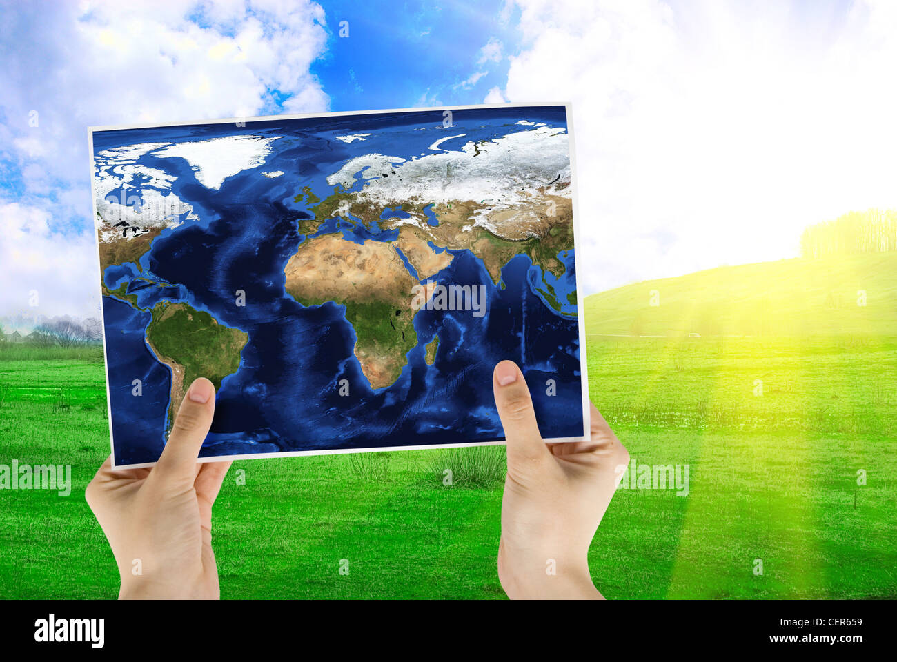 Hand holding map at beauty sunset on background Stock Photo - Alamy