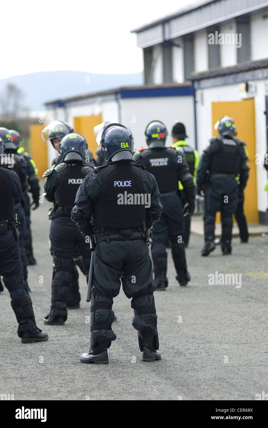 Uk riot police at the scene of a civil disturbance Stock Photo - Alamy