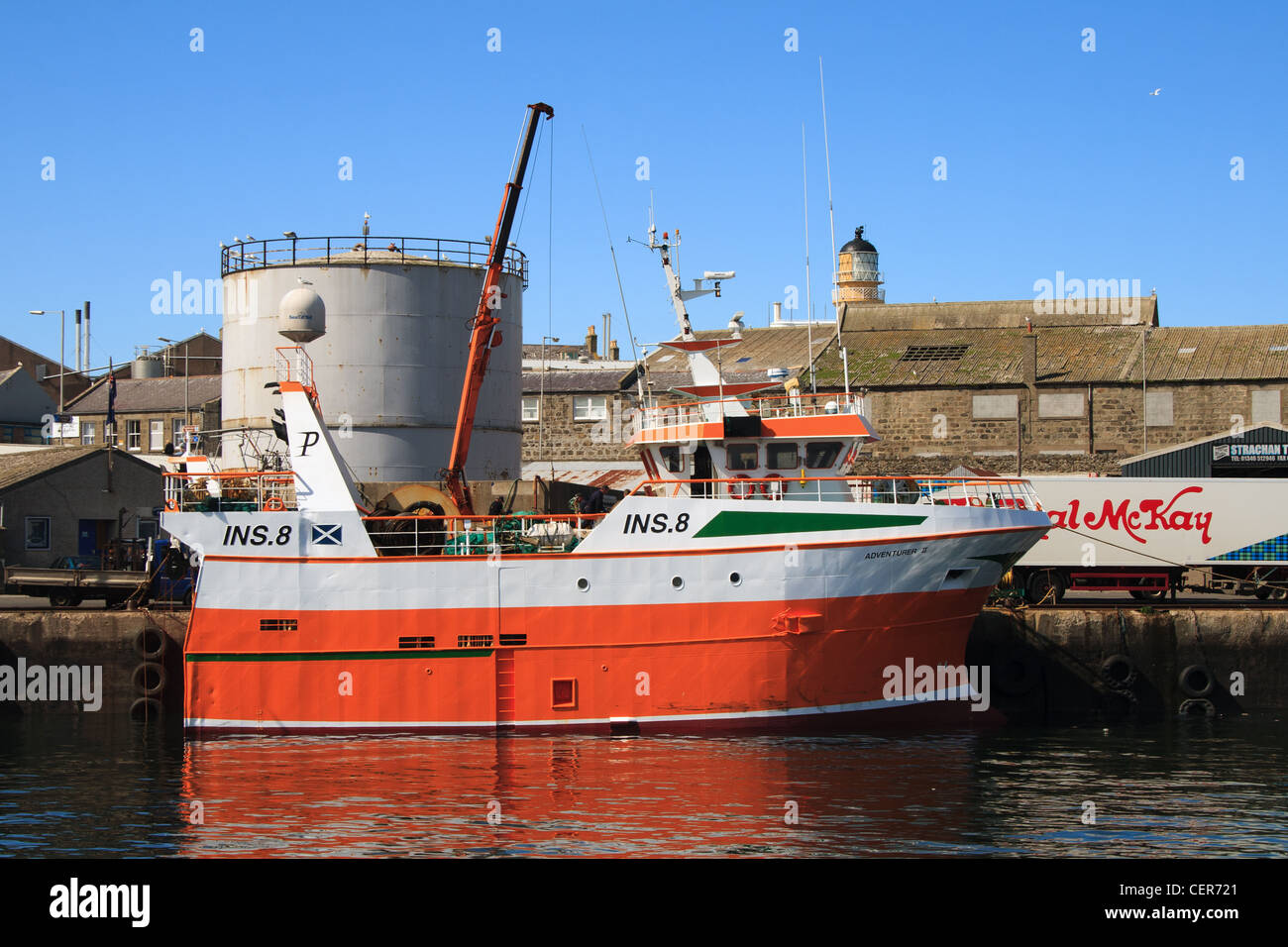 fishing boat berthed in harbour Stock Photo - Alamy