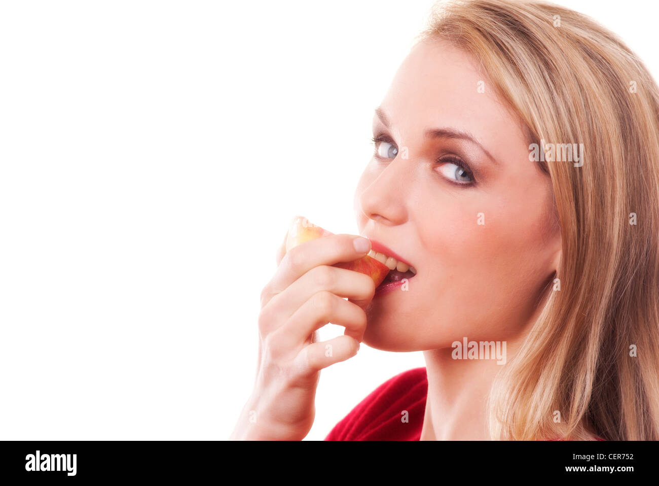 woman biting into an apple Stock Photo - Alamy