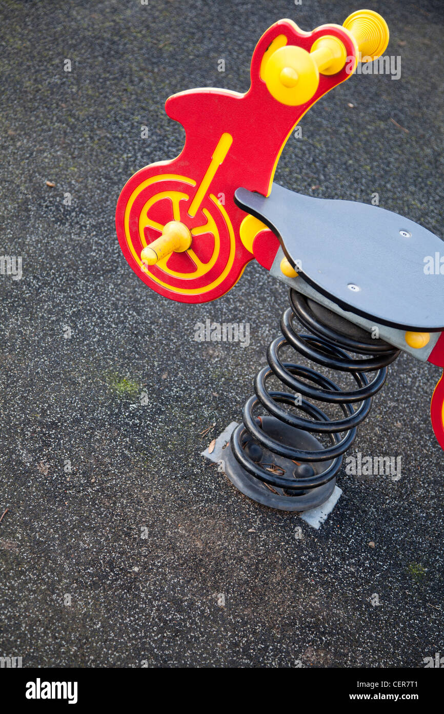 Kids Spring Play Bike in Park Stock Photo - Alamy