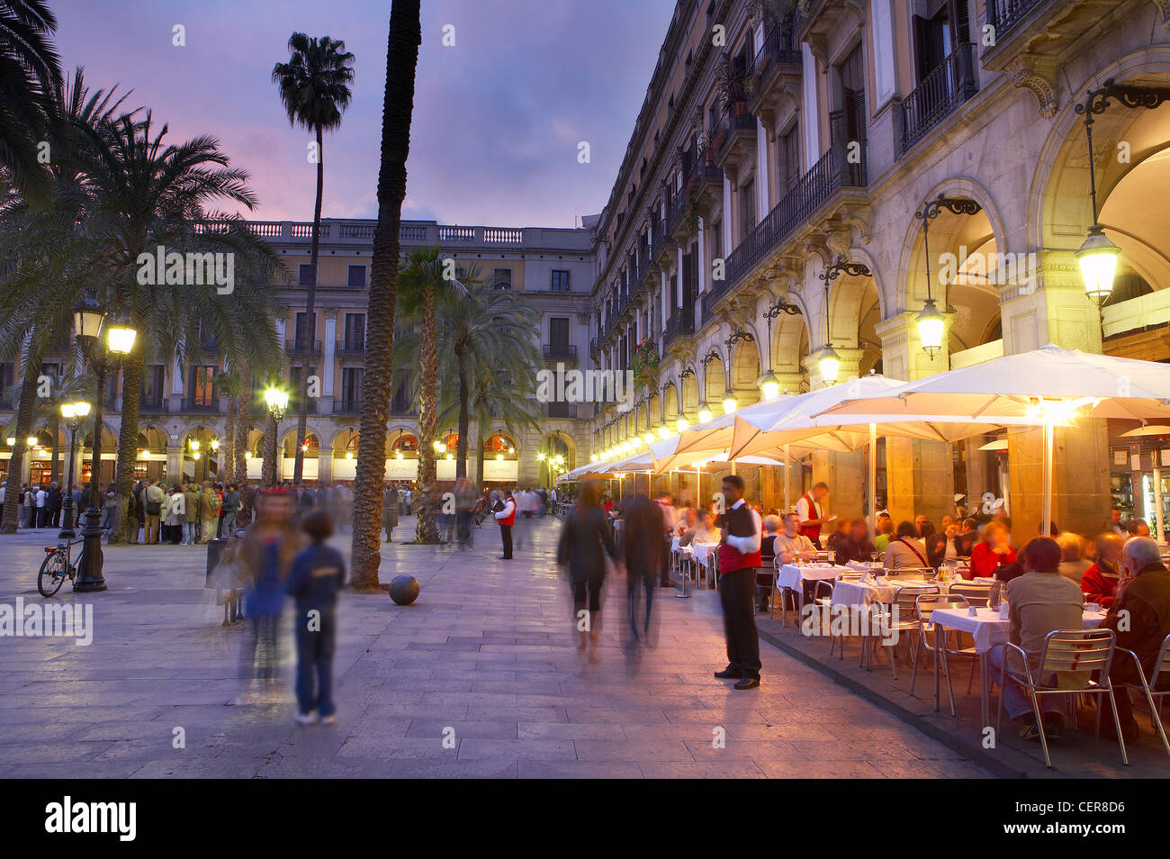 diners at a restaurant in Placa Real at dusk, the Barri Gotic (Old Town ...