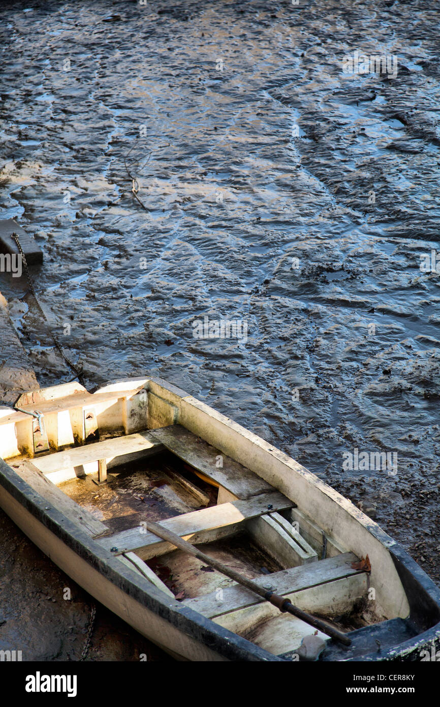 Rowing boat in mud on River Thames embankment at Richmond Stock Photo ...
