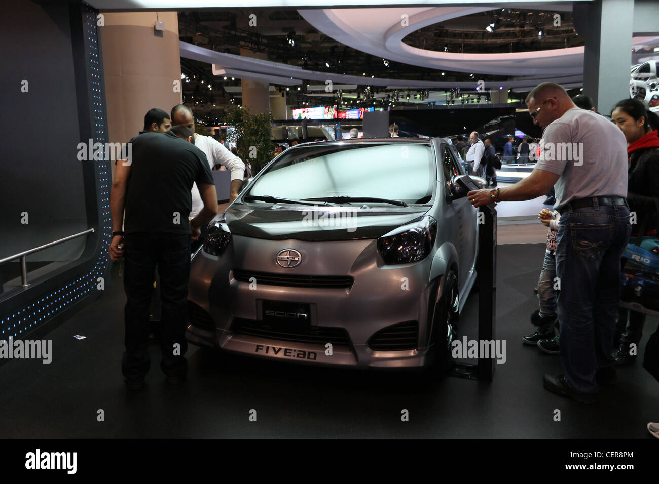 customers checking out car show room Stock Photo - Alamy