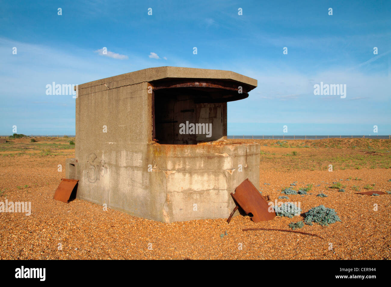 A derelict world war two pillbox on the beach at Landguard Point, the ...