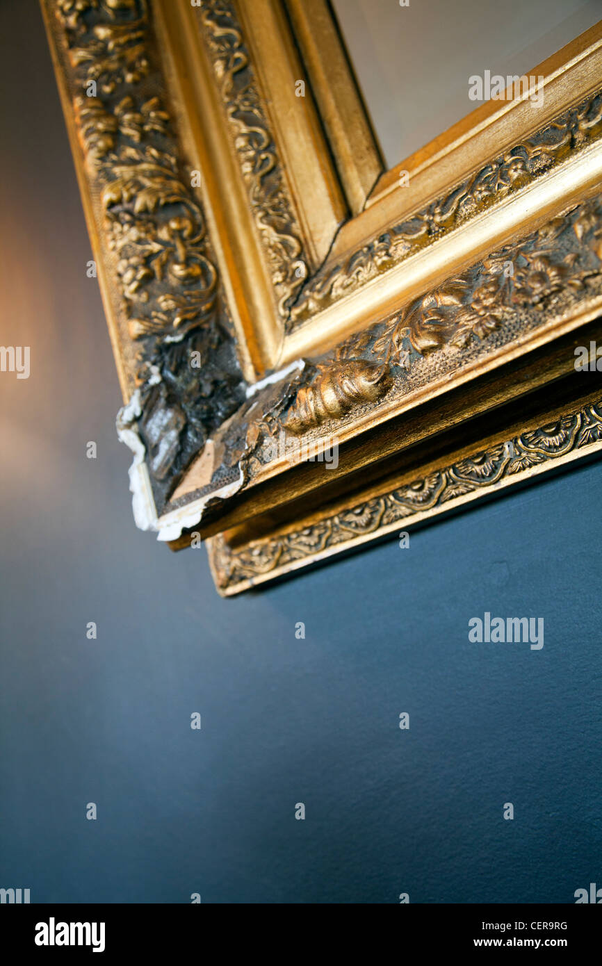 Corner of Chipped Gilded Frame on Wall Stock Photo - Alamy