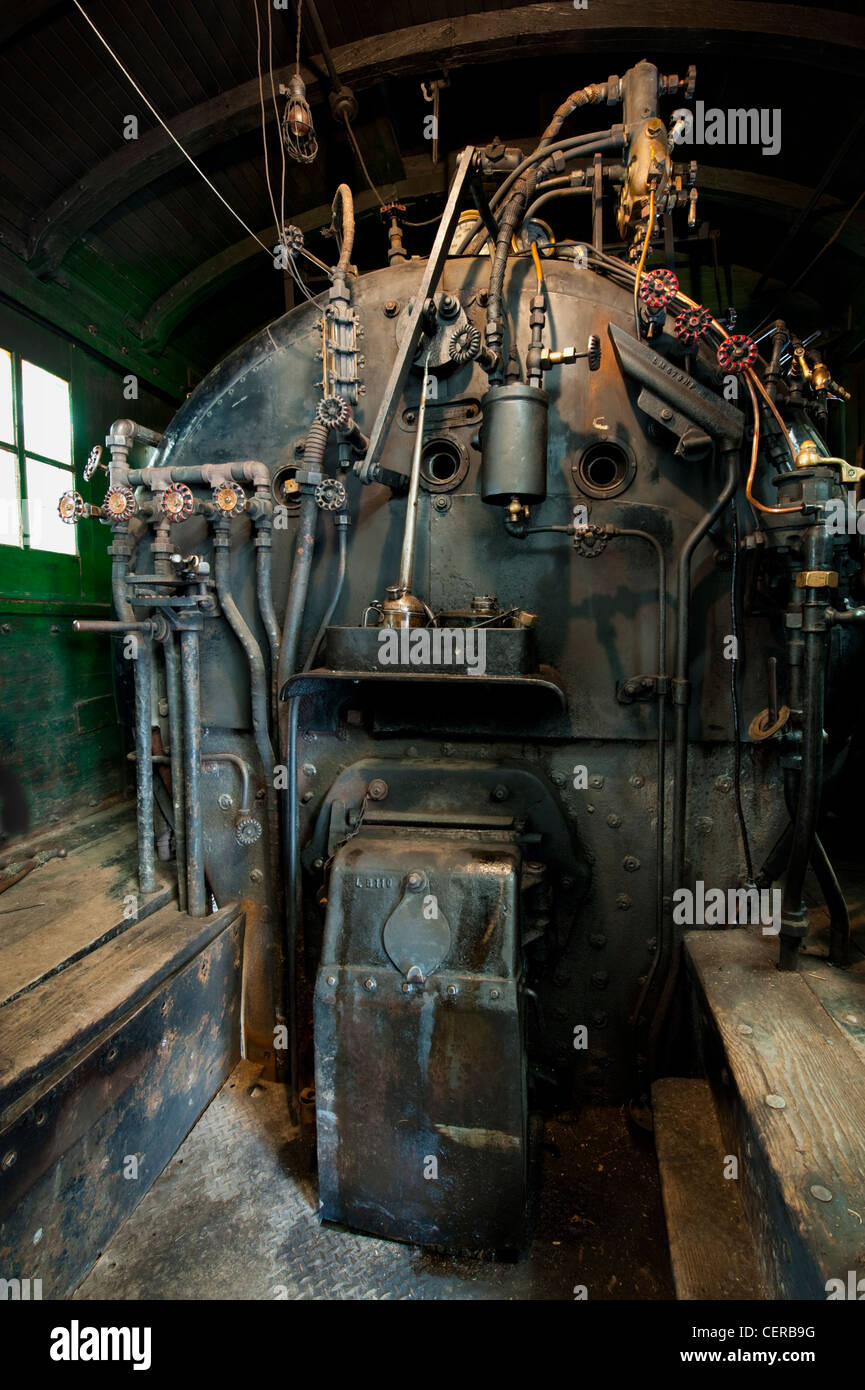 Interior of an antique steam engine that is 100 years old. It takes 3 ...