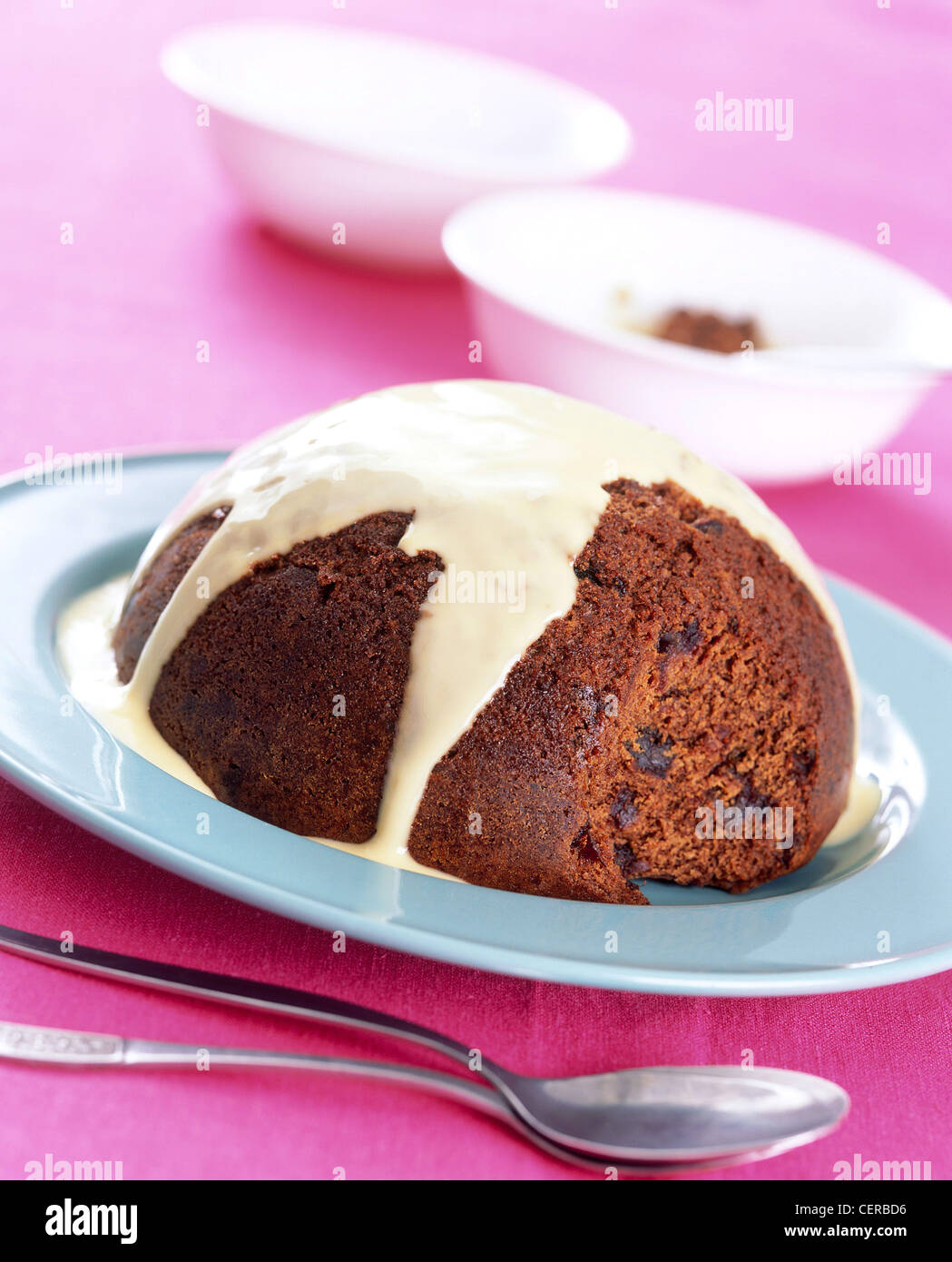 Steamed date pudding Steamed pudding a piece cut out custard on top, on ...