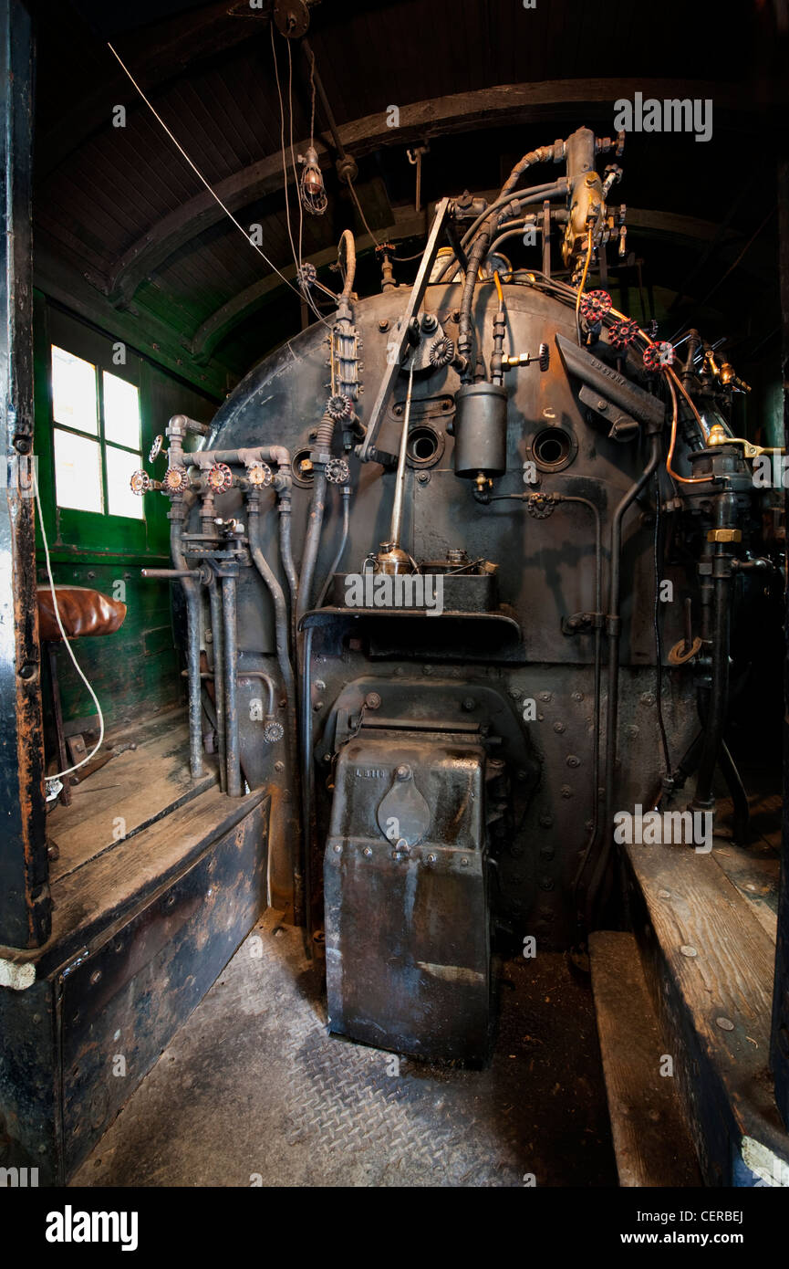 Interior of an antique steam engine that is 100 years old. It takes 3 ...