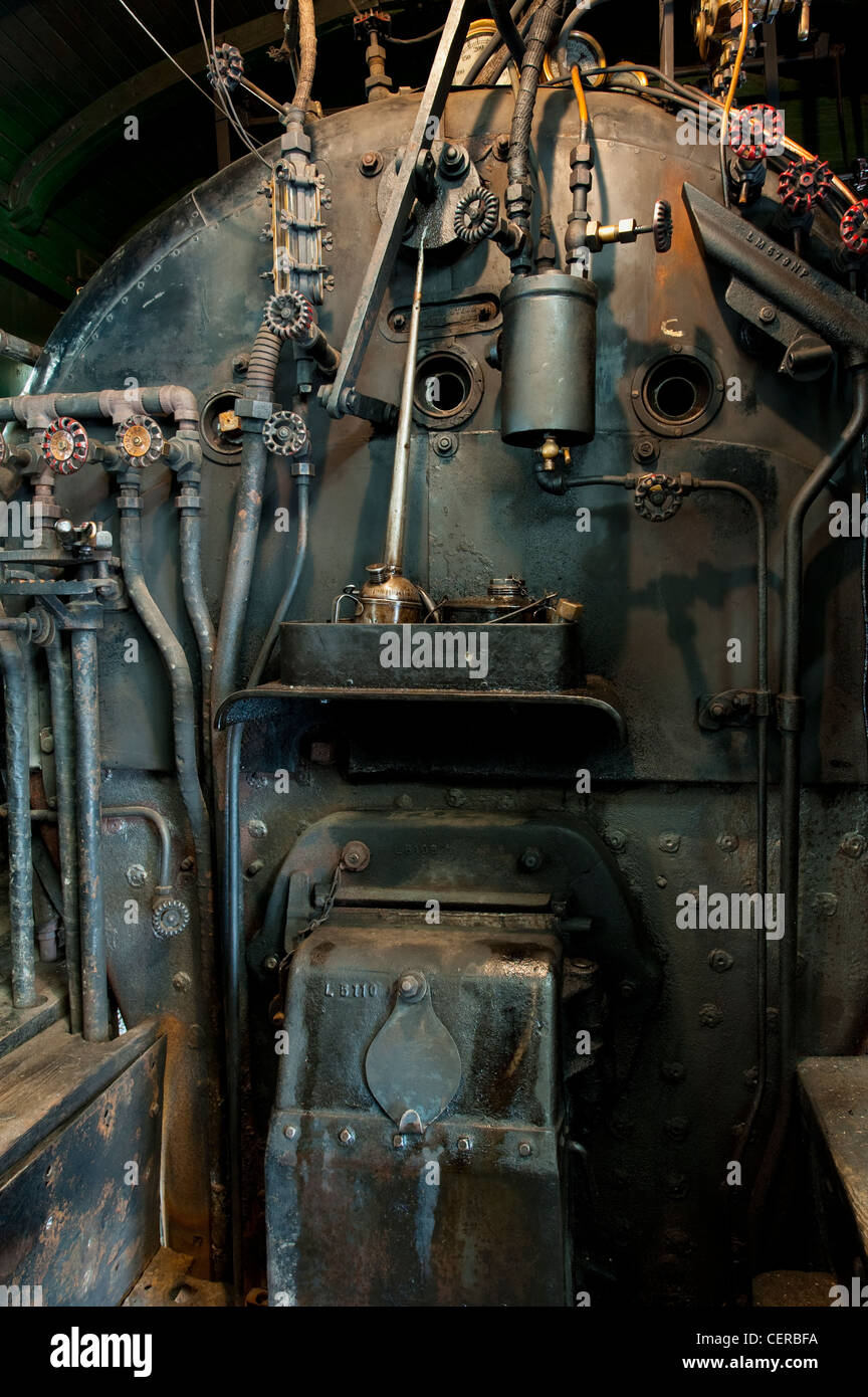Interior of an antique steam engine that is 100 years old. It takes 3 ...