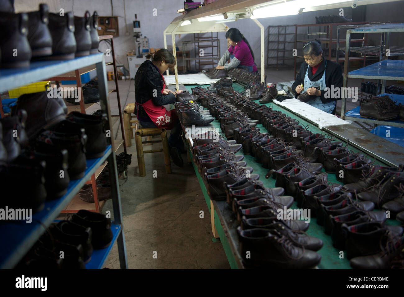 China shoes factory workers hi-res stock photography and images - Alamy