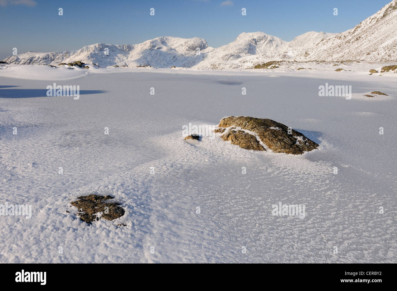 Frozen three tarns in the English Lake District, with Scafell and ...