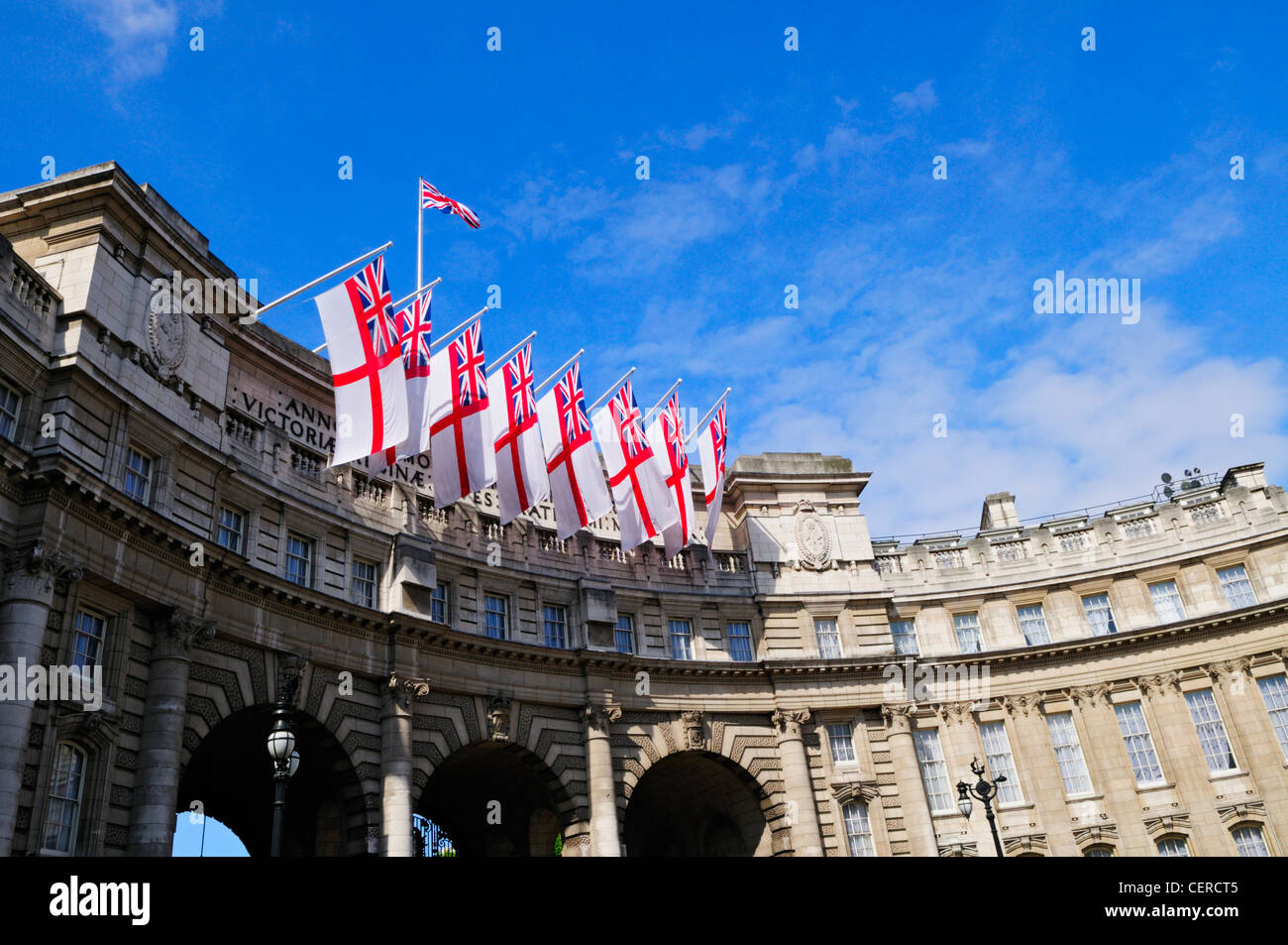 Admiralty Arch, a large office building built in 1912 with archways ...