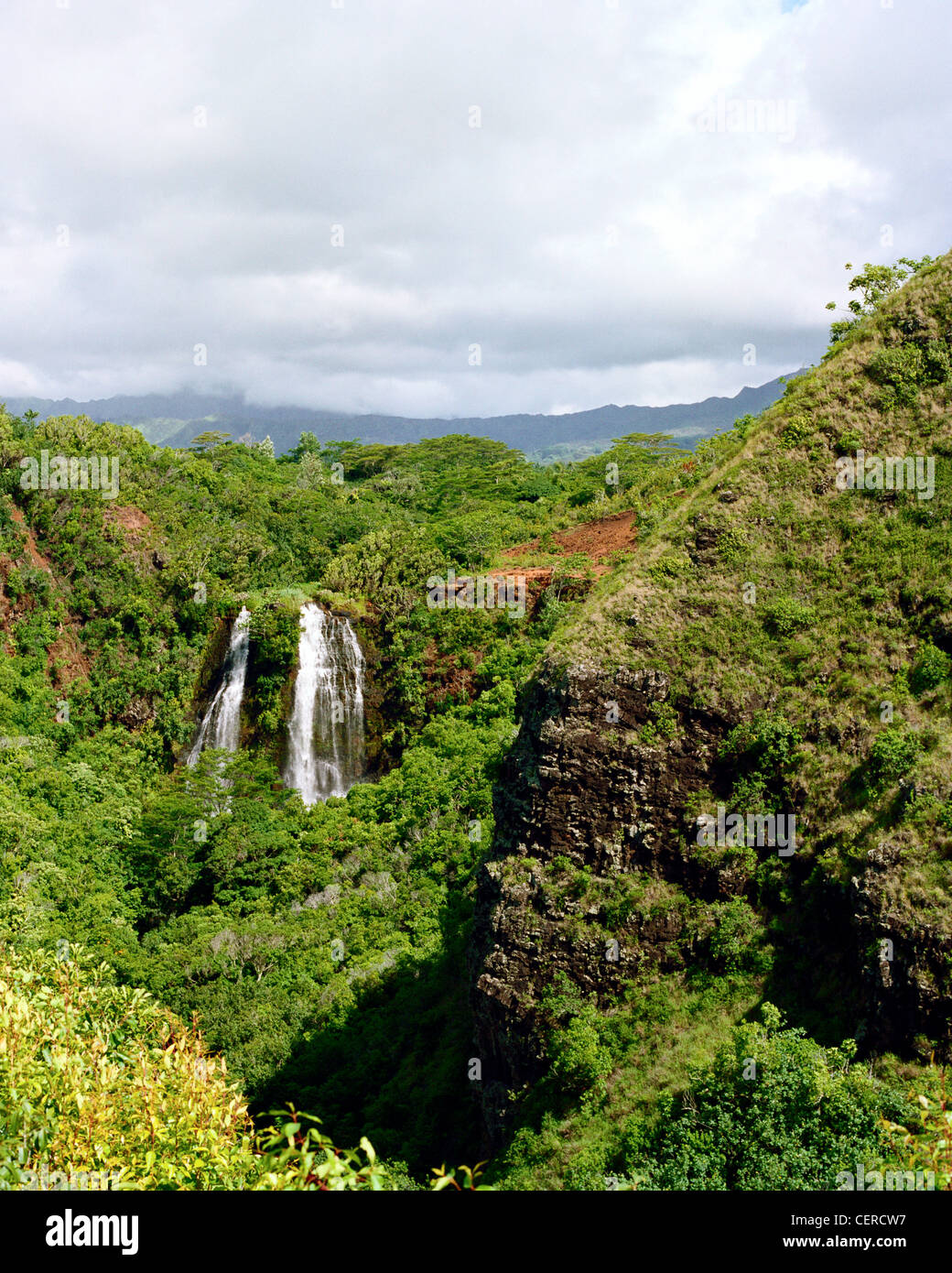 Opaekaa Falls against the Makaleha Mountains Kaua'i Hawaii Stock Photo ...