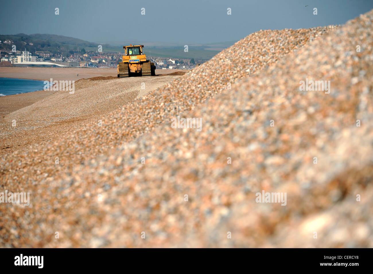 Rebuilding shingle beaches after winter storms, Seaford, East Sussex ...