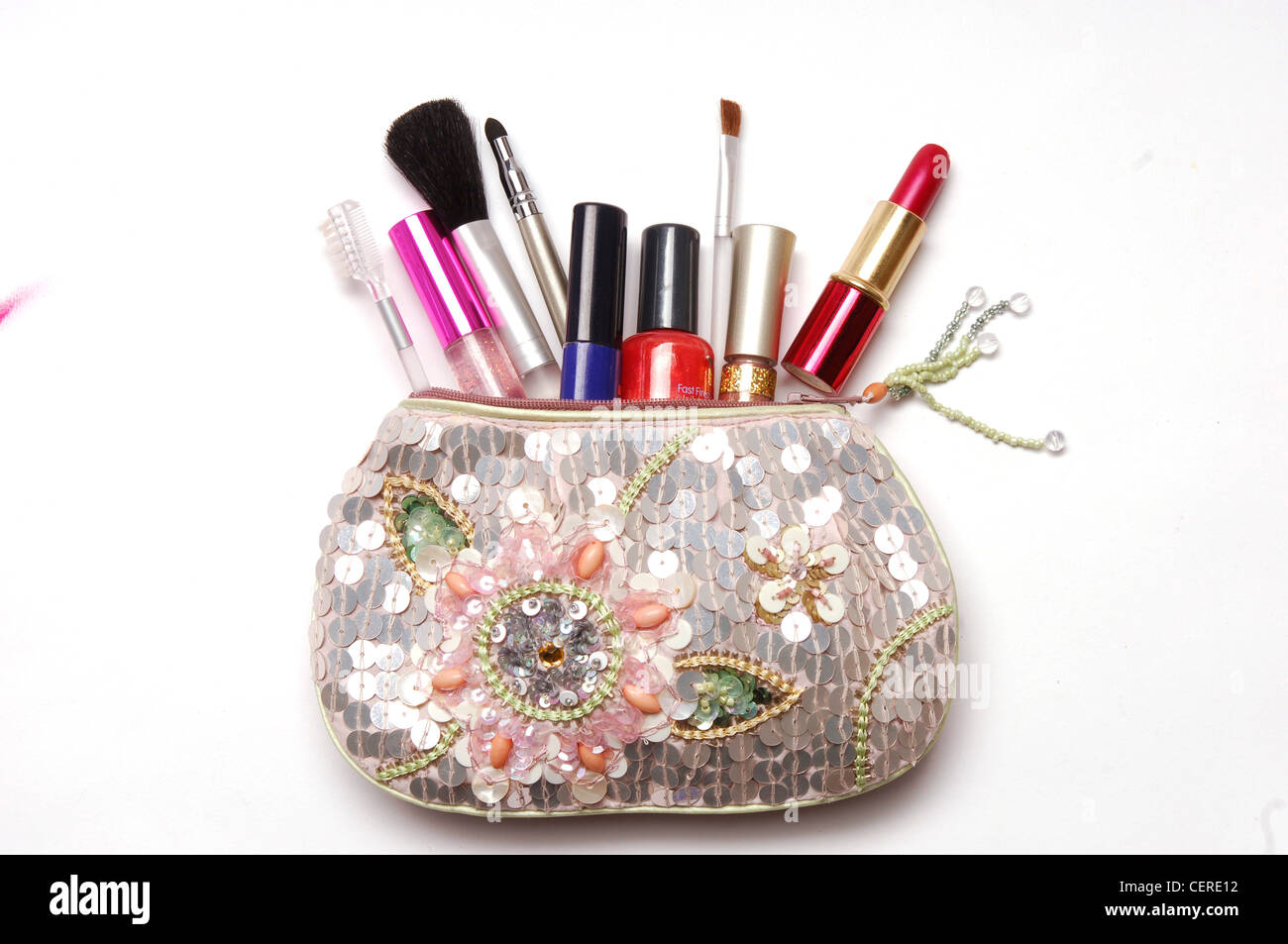 Make up bag with sequins and beads, make up products Stock Photo - Alamy