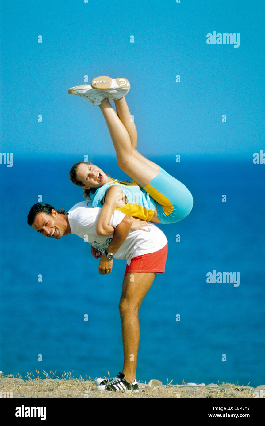 Man lifting woman up legs hi-res stock photography and images - Alamy