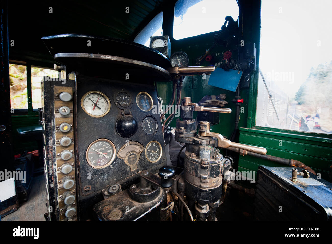 An vintage diesel train interior showing all the knobs, dials, and ...