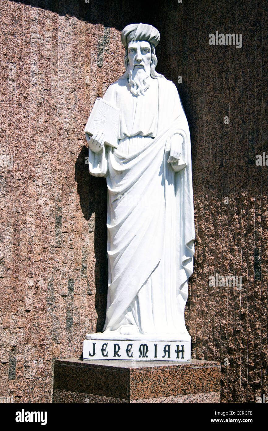 A marble statue of Jeremiah situated in a corner of a momausoleum at ...