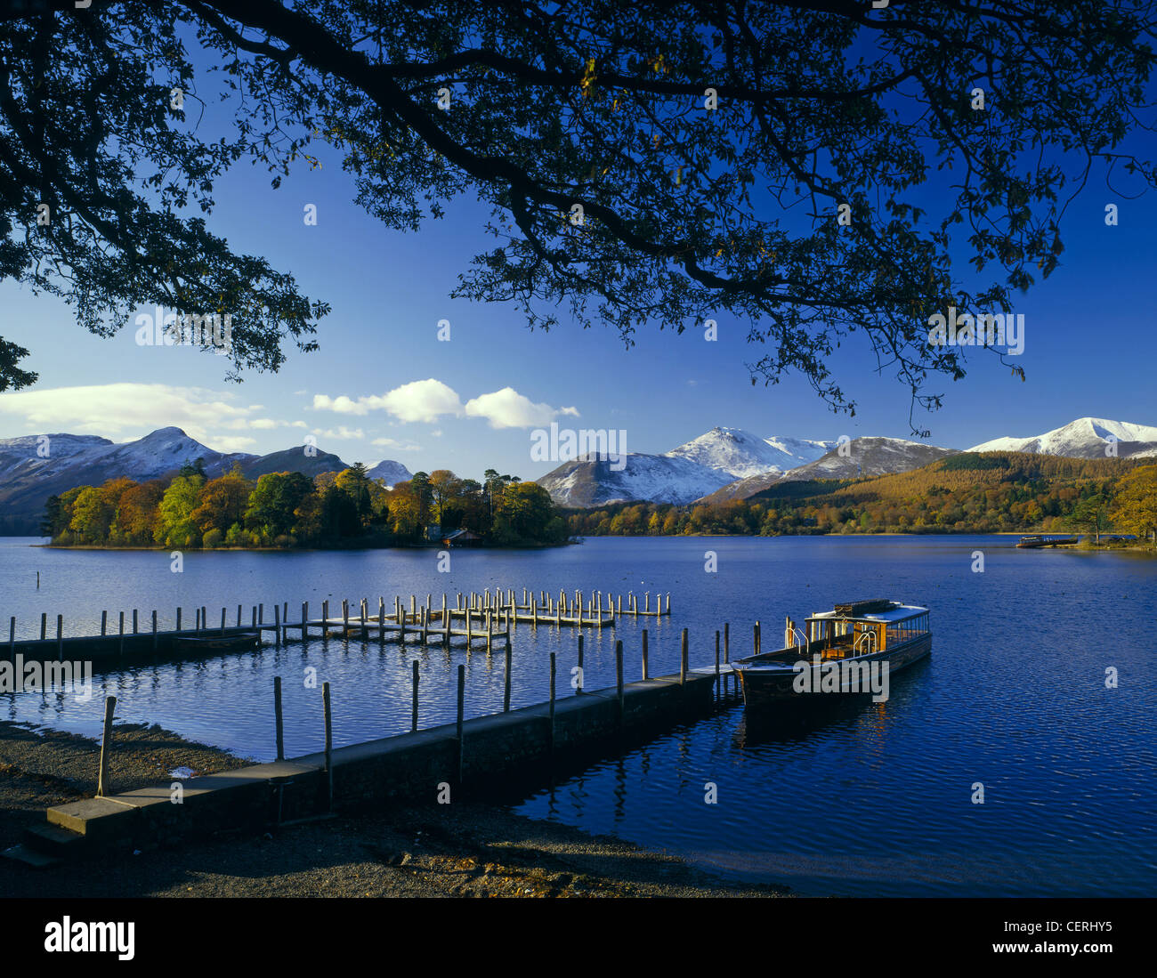 Boat tied to a jetty on Derwent Water at Friar's Crag Stock Photo - Alamy