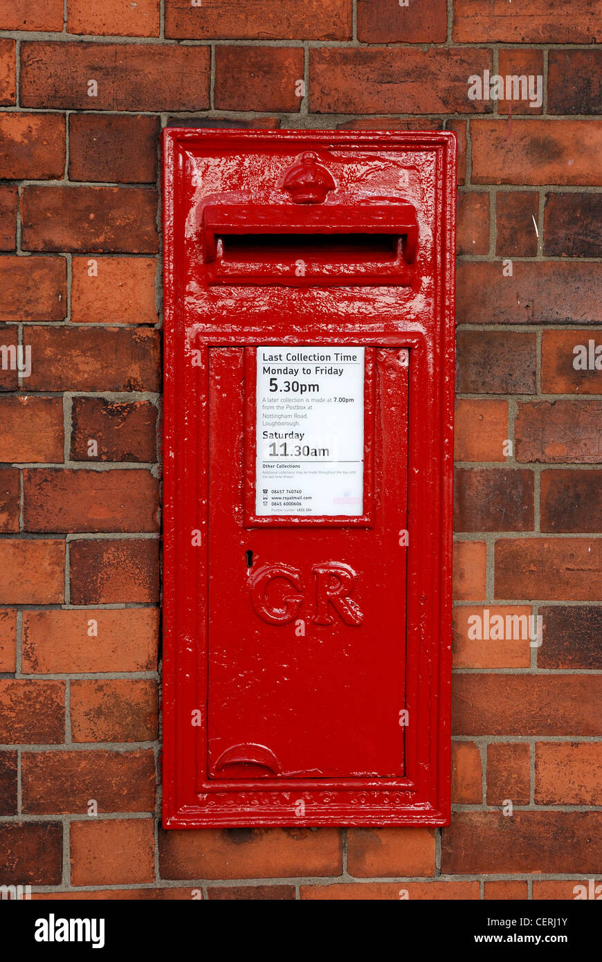 royal mail red post office box in a wall england uk Stock Photo - Alamy