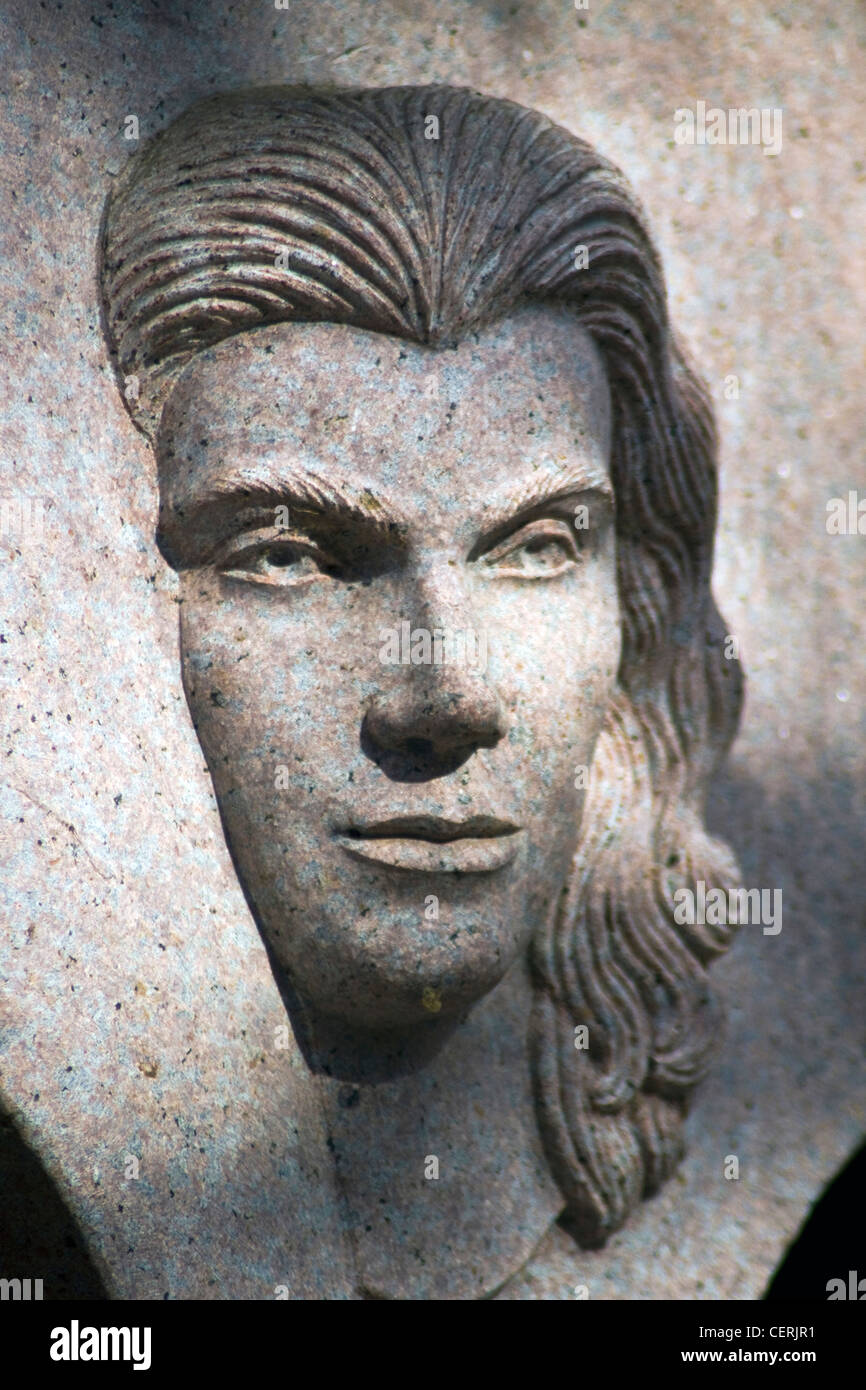 A bust of a female bas relief on a granite mausoleum at Oak Hill ...