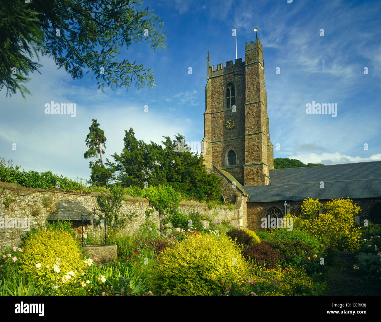 A garden by the church in Dunster Stock Photo - Alamy