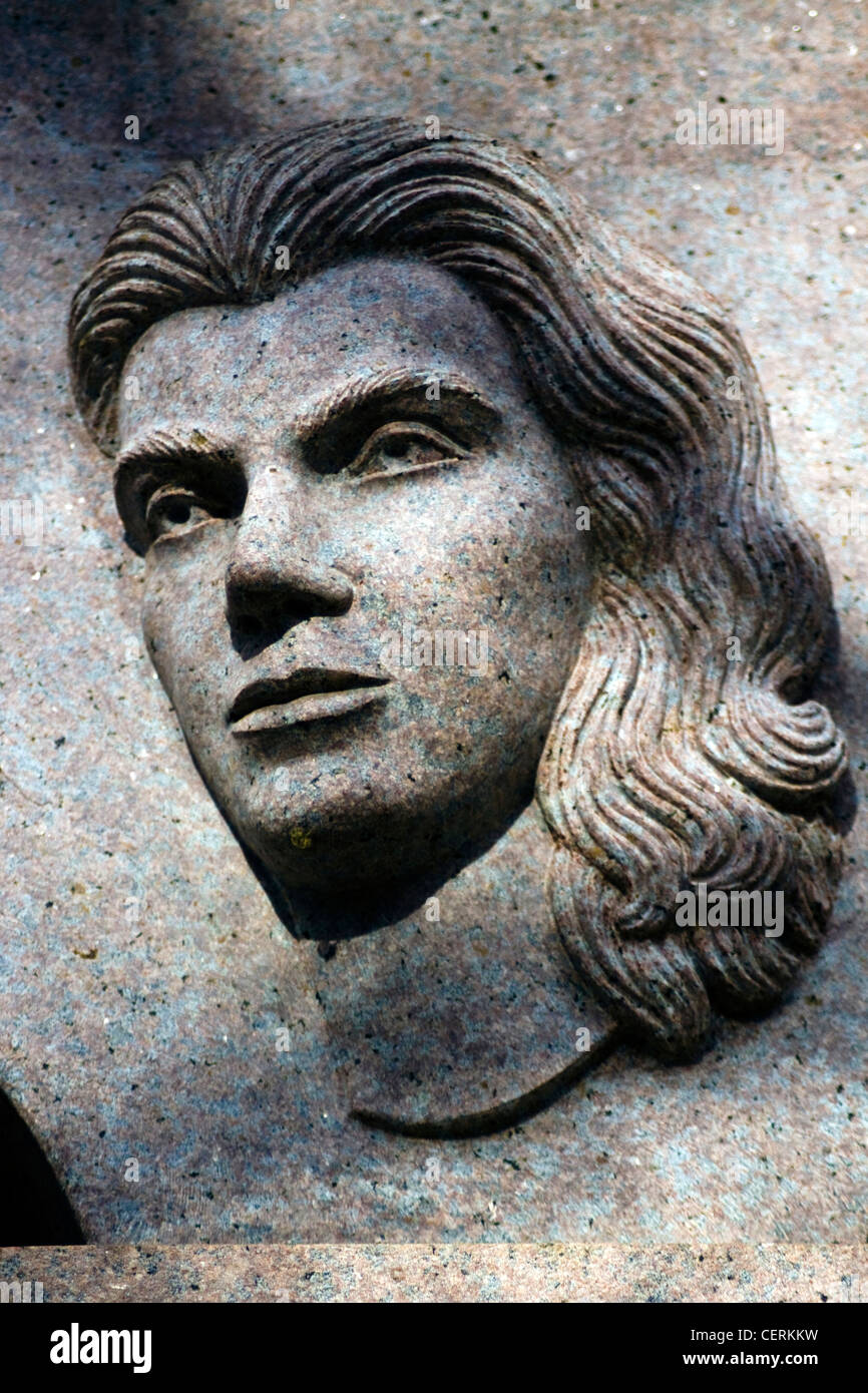 A bust of a female bas relief on a granite mausoleum at Oak Hill ...