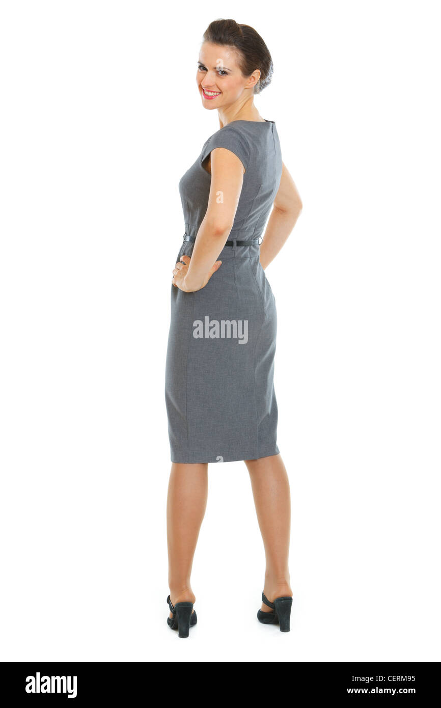 Smiling business woman turn round Stock Photo - Alamy