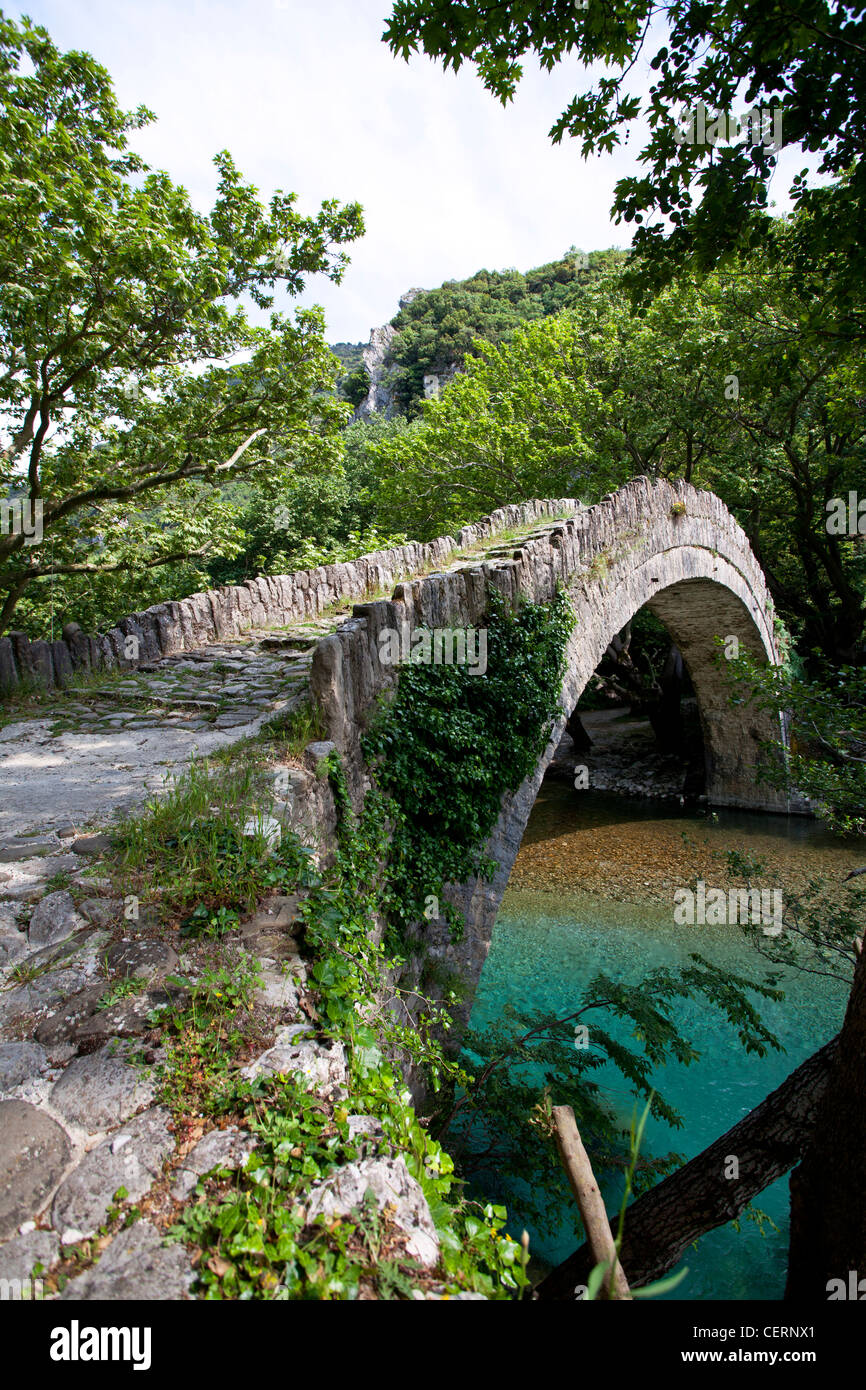 old Greek traditional arch style stone bridge at a nature protected ...