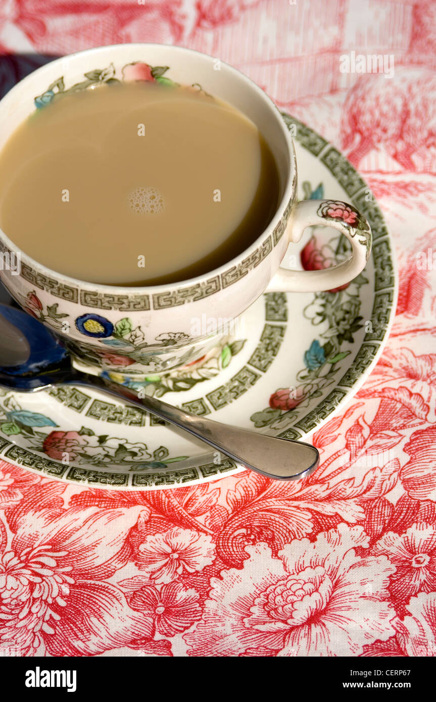 An English cream teaCup of tea in a floral cup and saucer Stock Photo ...