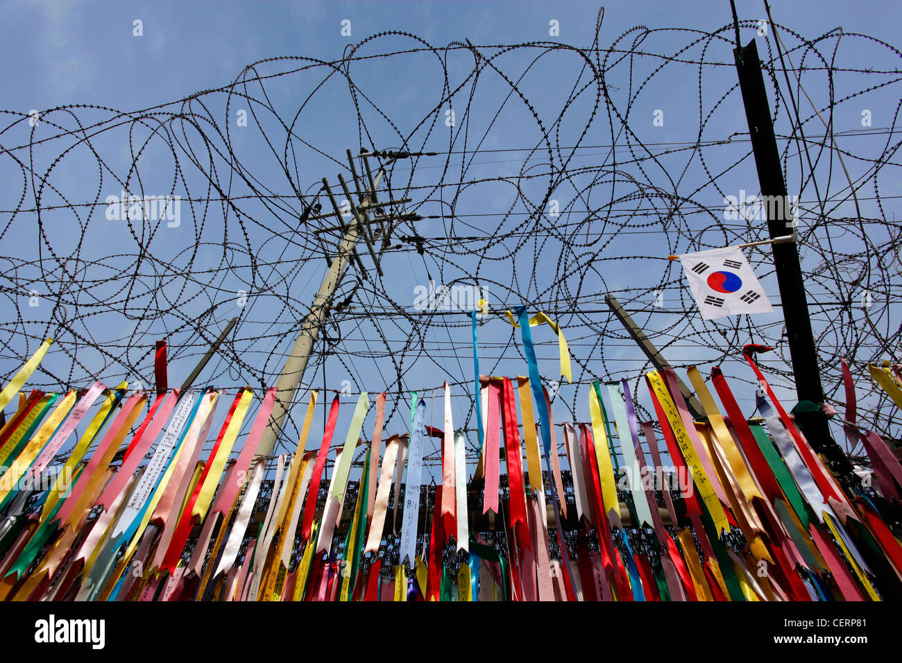 Barbed wire and wish ribbons wishing for peace and unity at the DMZ, De ...