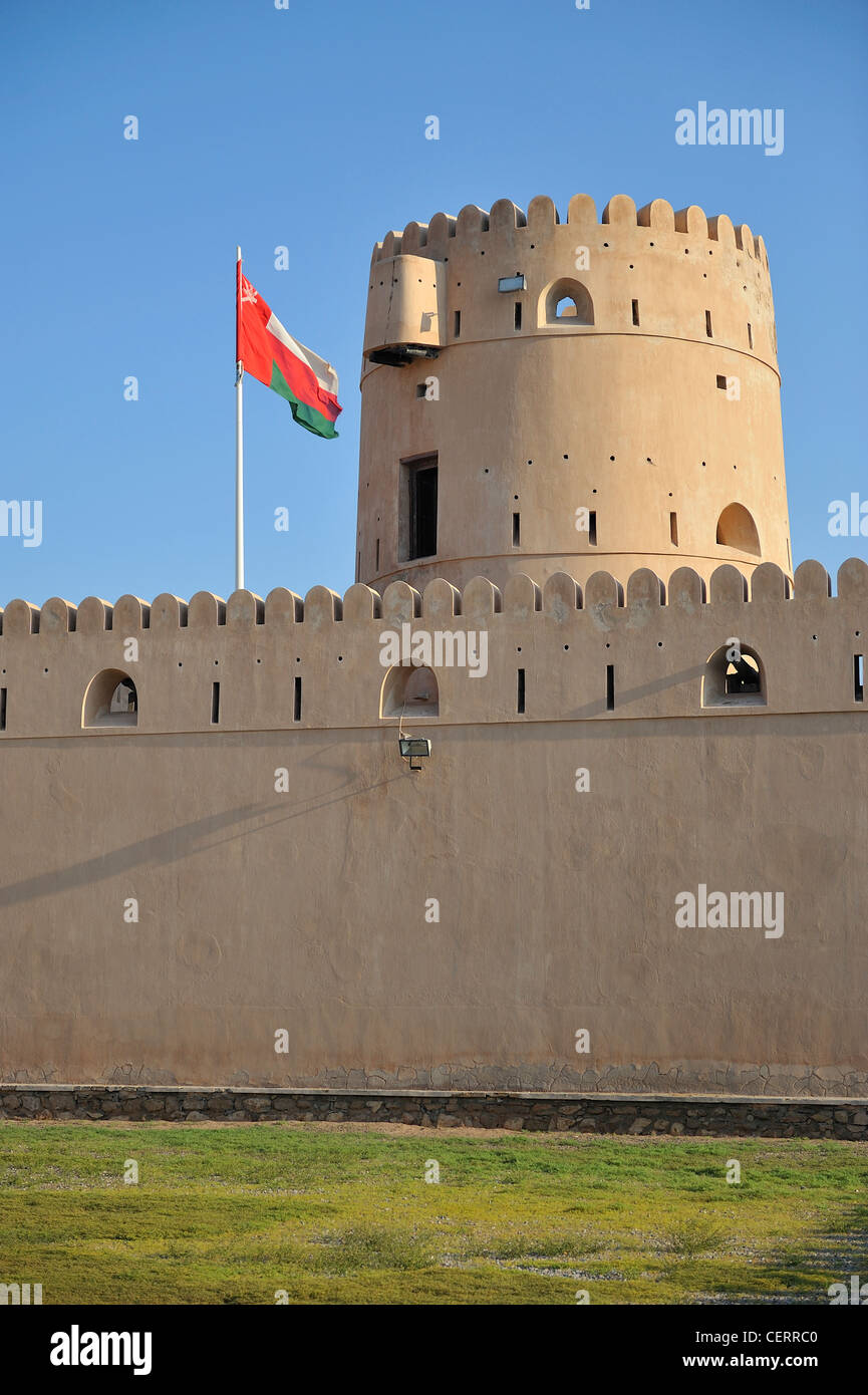 The Oman's flag in the ramparts of the beautiful fort at Ras Al Hadd ...