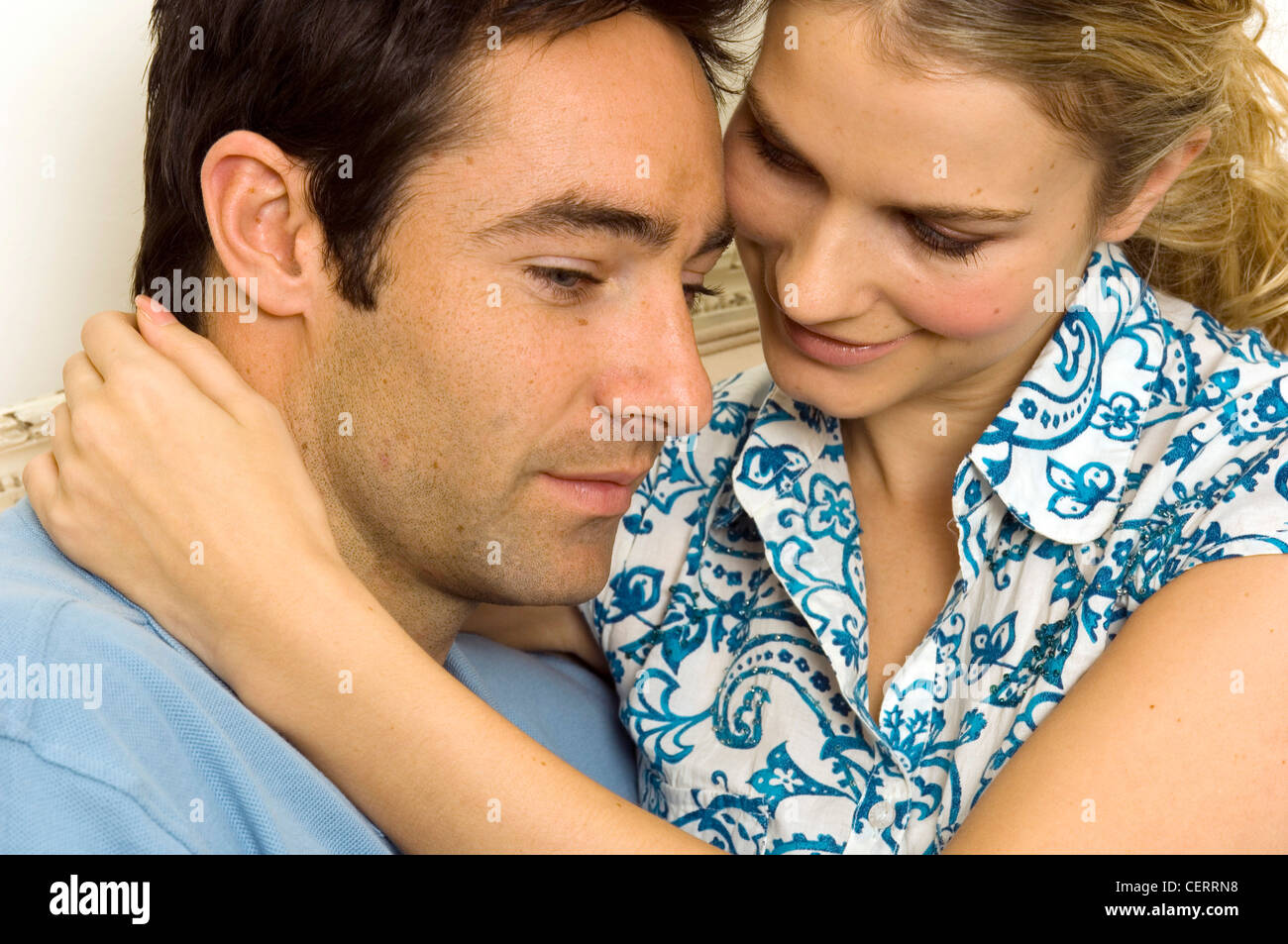 Woman arms around neck man hi-res stock photography and images - Alamy