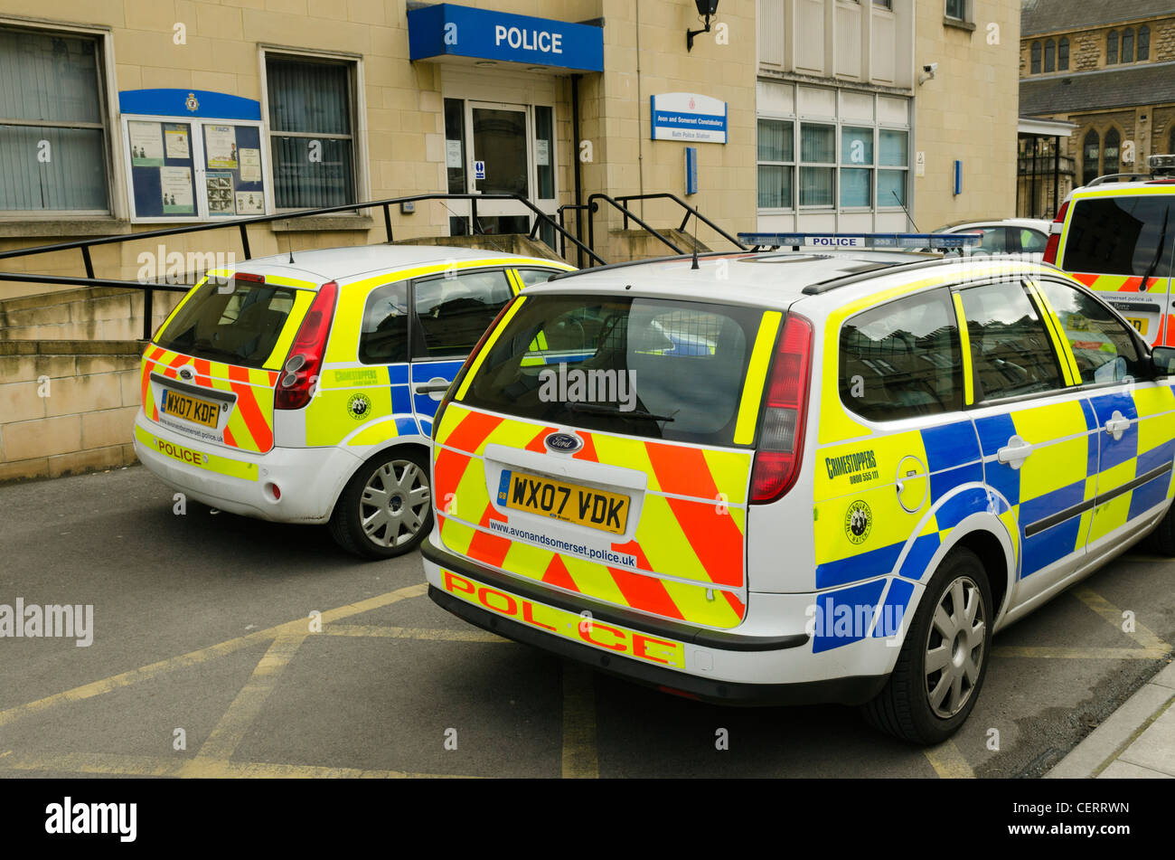 Stationary police cars and vehicles parked outside Bath Police station ...