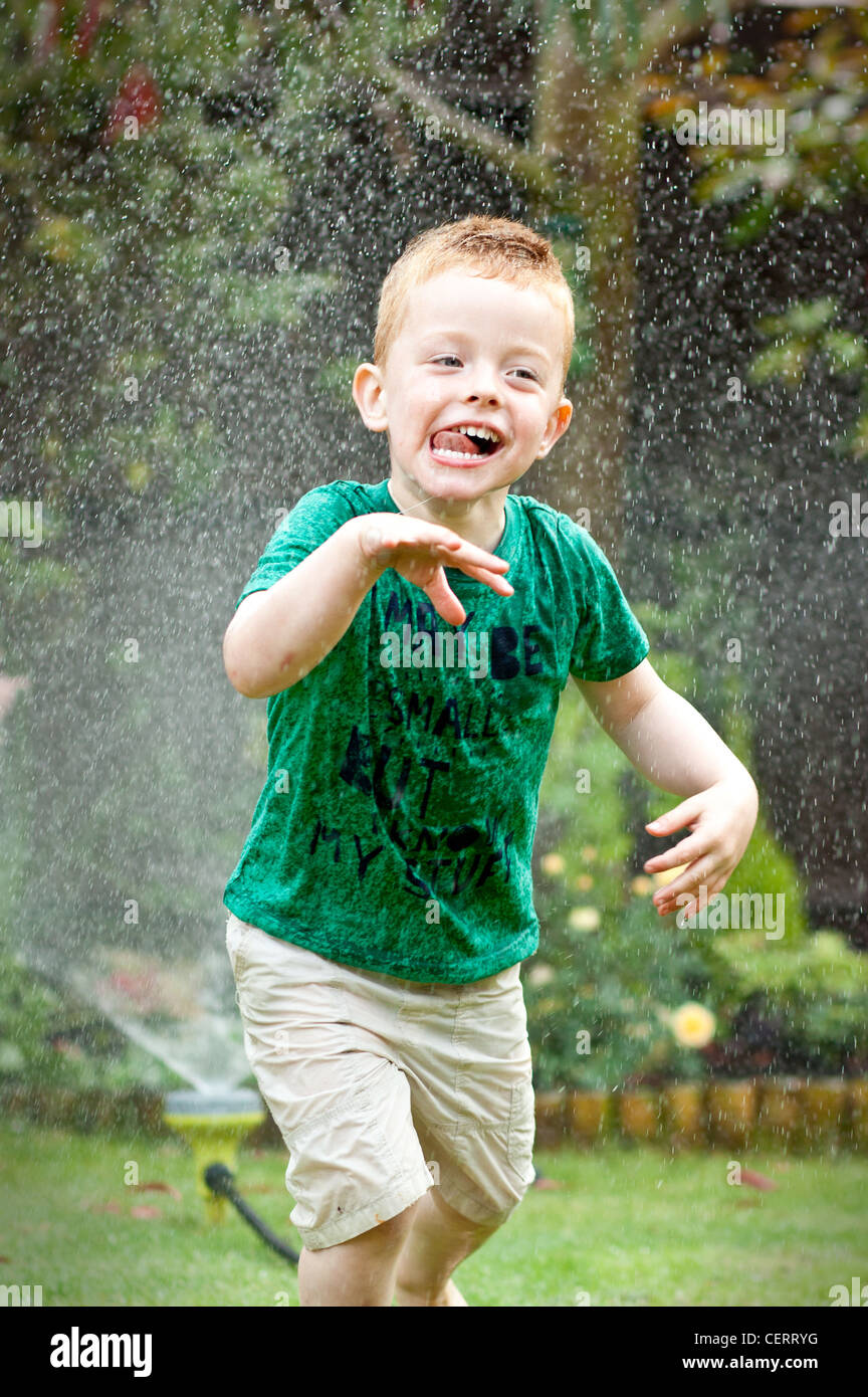 Soaking wet boy hi-res stock photography and images - Alamy