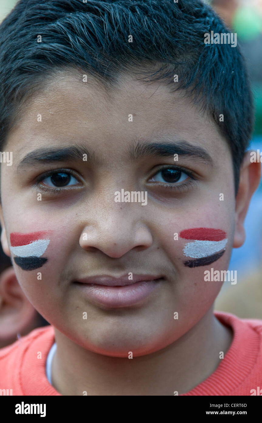 Egyptian boy with Egyptian flag on cheeks Stock Photo - Alamy