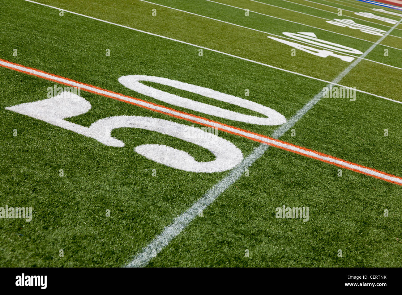 The 50 hard line on an American football field with artificial turf ...