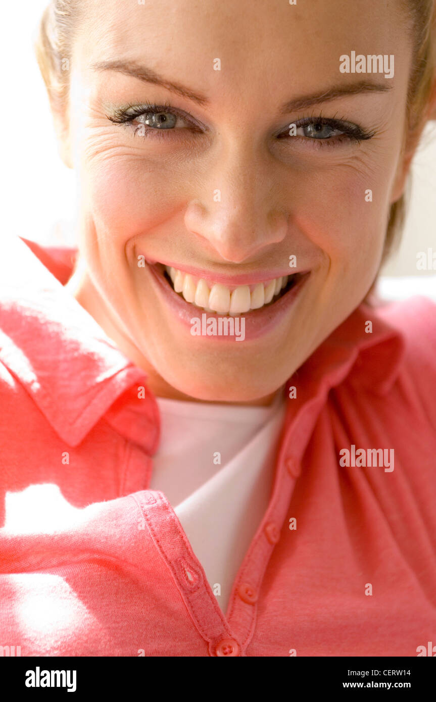 Female smiling to camera Stock Photo - Alamy