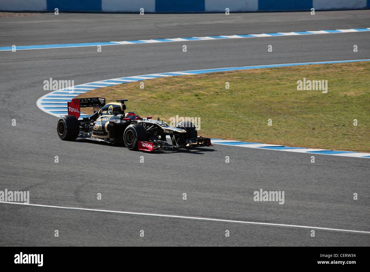 Romain Grosjean driving Lotus Renault F1 racing car during track ...