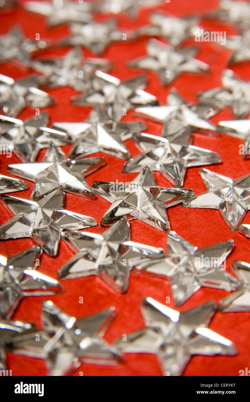 Silver stars on a red background Stock Photo - Alamy